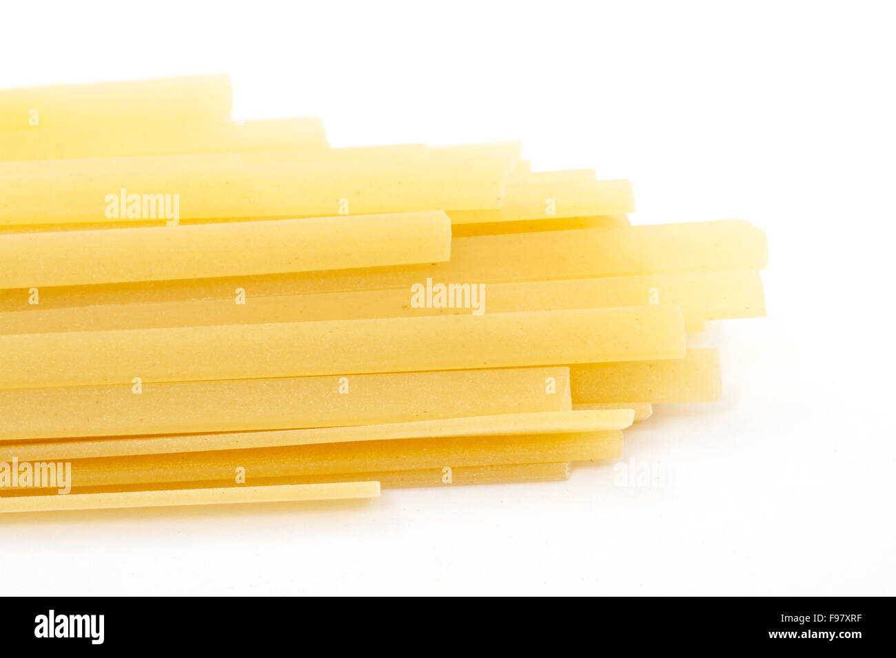 Dry spaghetti isolated on white Stock Photo - Alamy