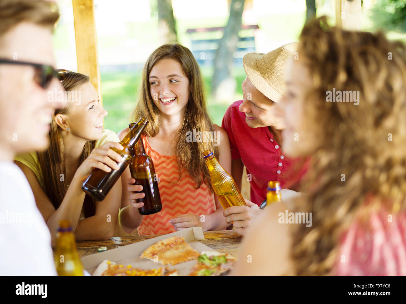 Group of happy friends drinking and having fun in pub garden Stock ...