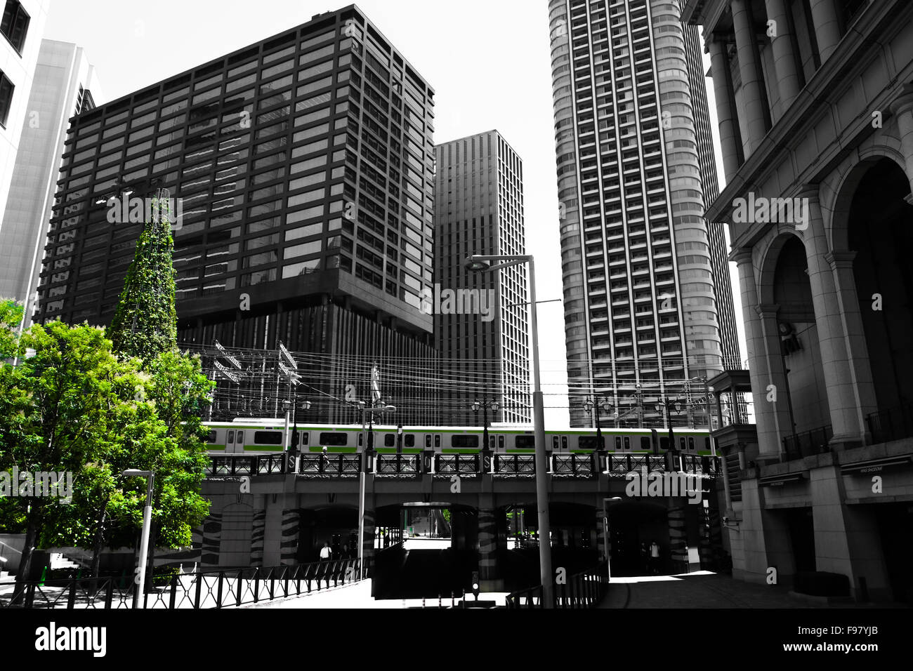 Train And Buildings In City Stock Photo - Alamy
