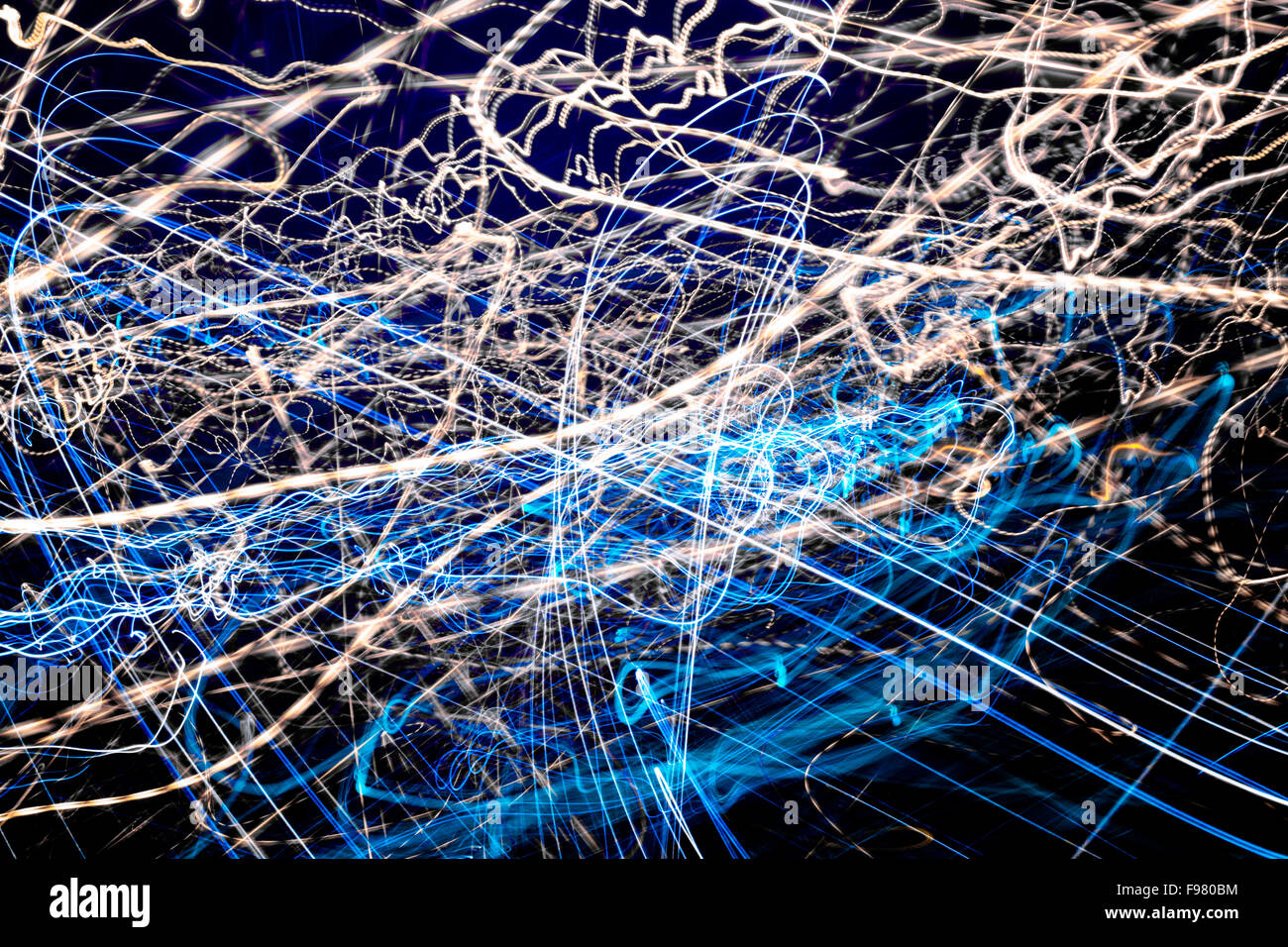 White and Blue neon colors dominate this light painting abstract. The ...
