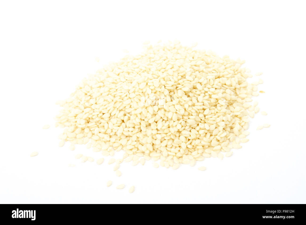 A close up on a pile of dried Sesame Seed isolated on a white ...