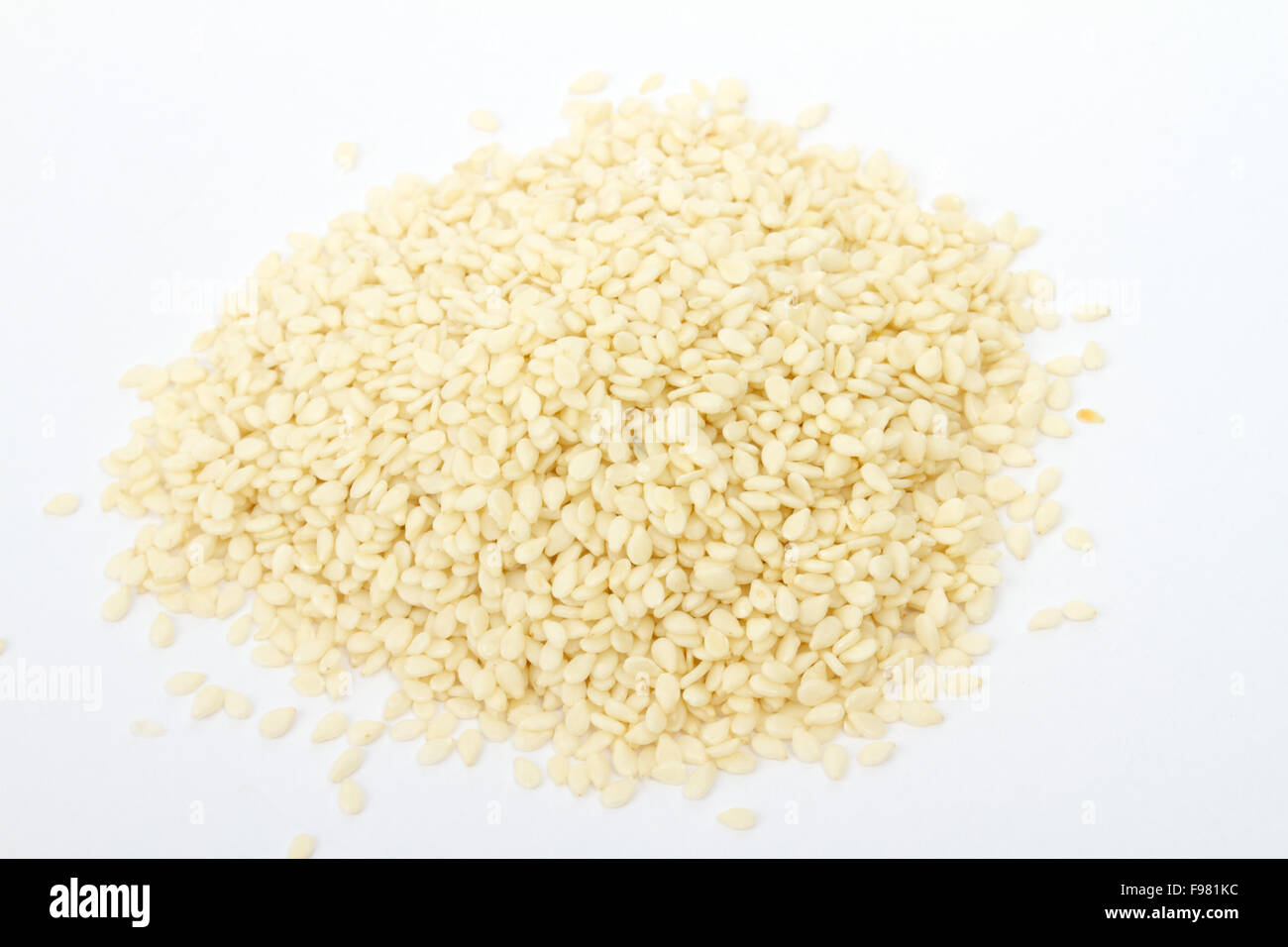 A close up on a pile of dried Sesame Seed isolated on a white ...