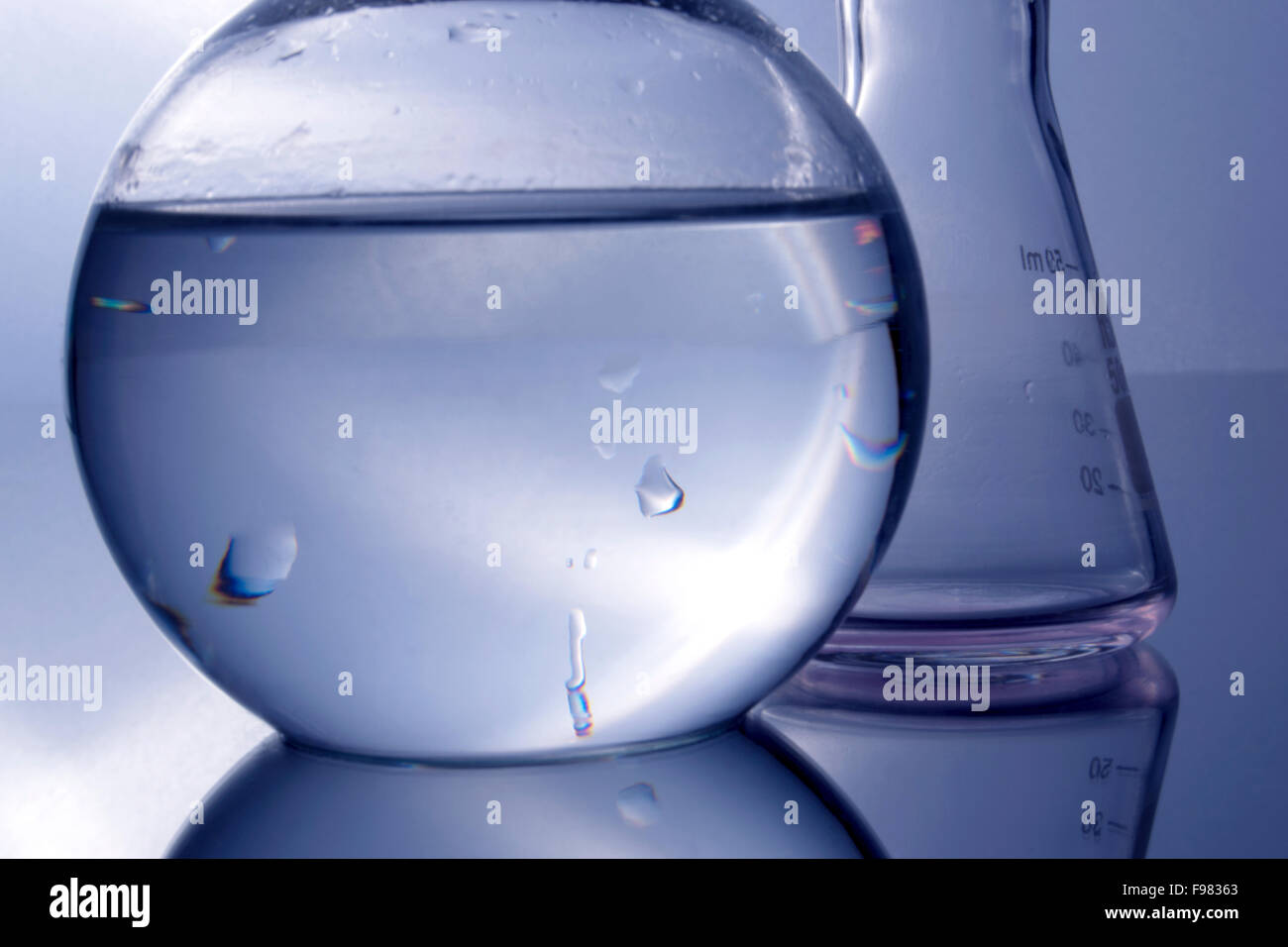 chemistry experiment with flasks Stock Photo - Alamy