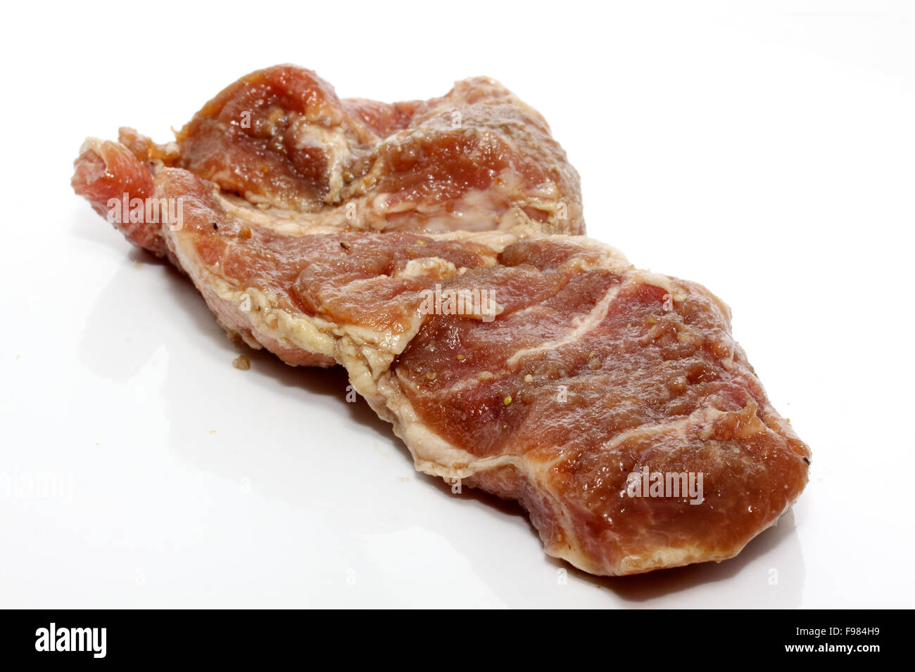 fresh boneless pork isolated on white background Stock Photo - Alamy