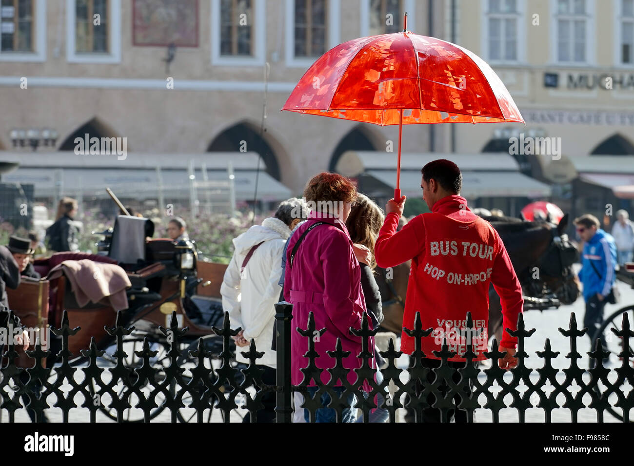 Bus tour guide in Old Town Square in Prague Stock Photo - Alamy