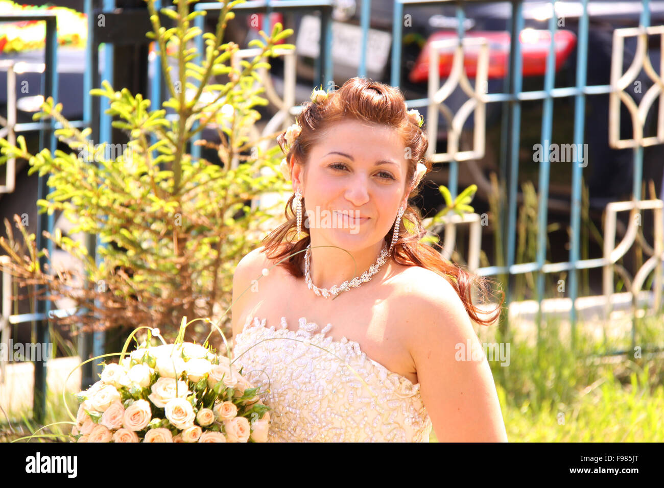 sitting beauty bride in white dress Stock Photo - Alamy