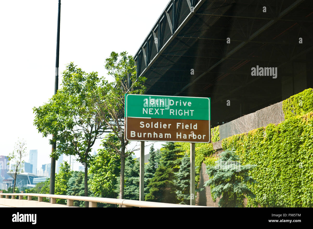 Street sign mentioning 18th Drive on the next right infront of the ...