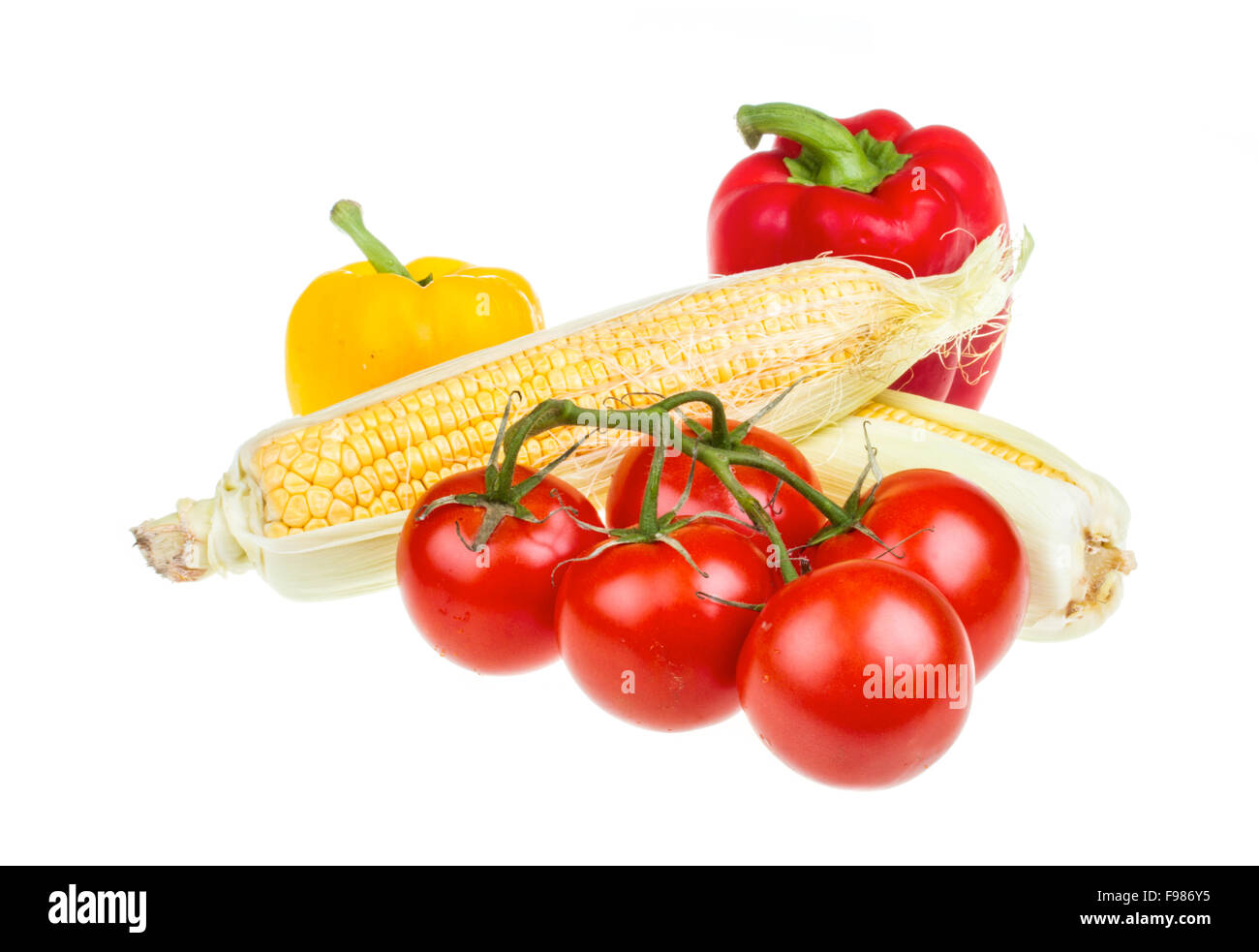 pepper, ripe yellow corn and tomato Stock Photo - Alamy