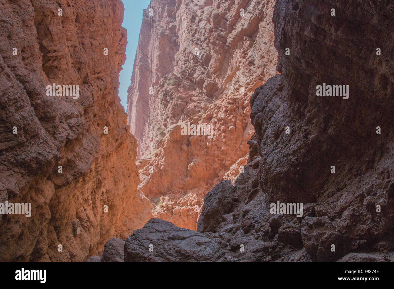 Way out of dark red canyon into the light Stock Photo - Alamy