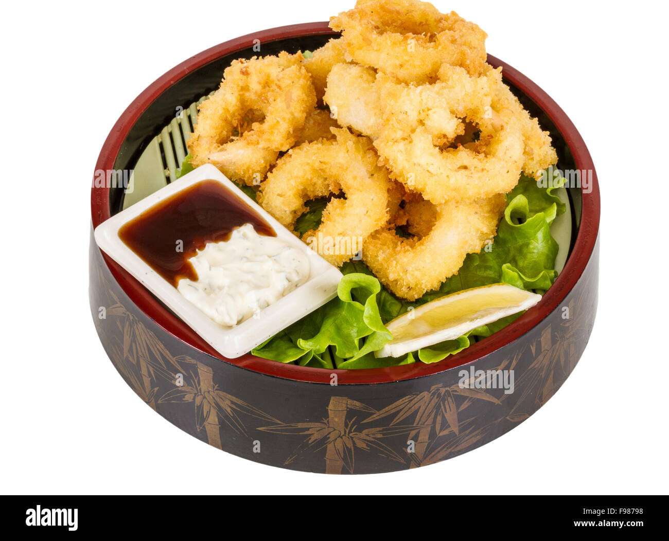 Deep batter fried squid rings calamari with green salad Stock Photo - Alamy