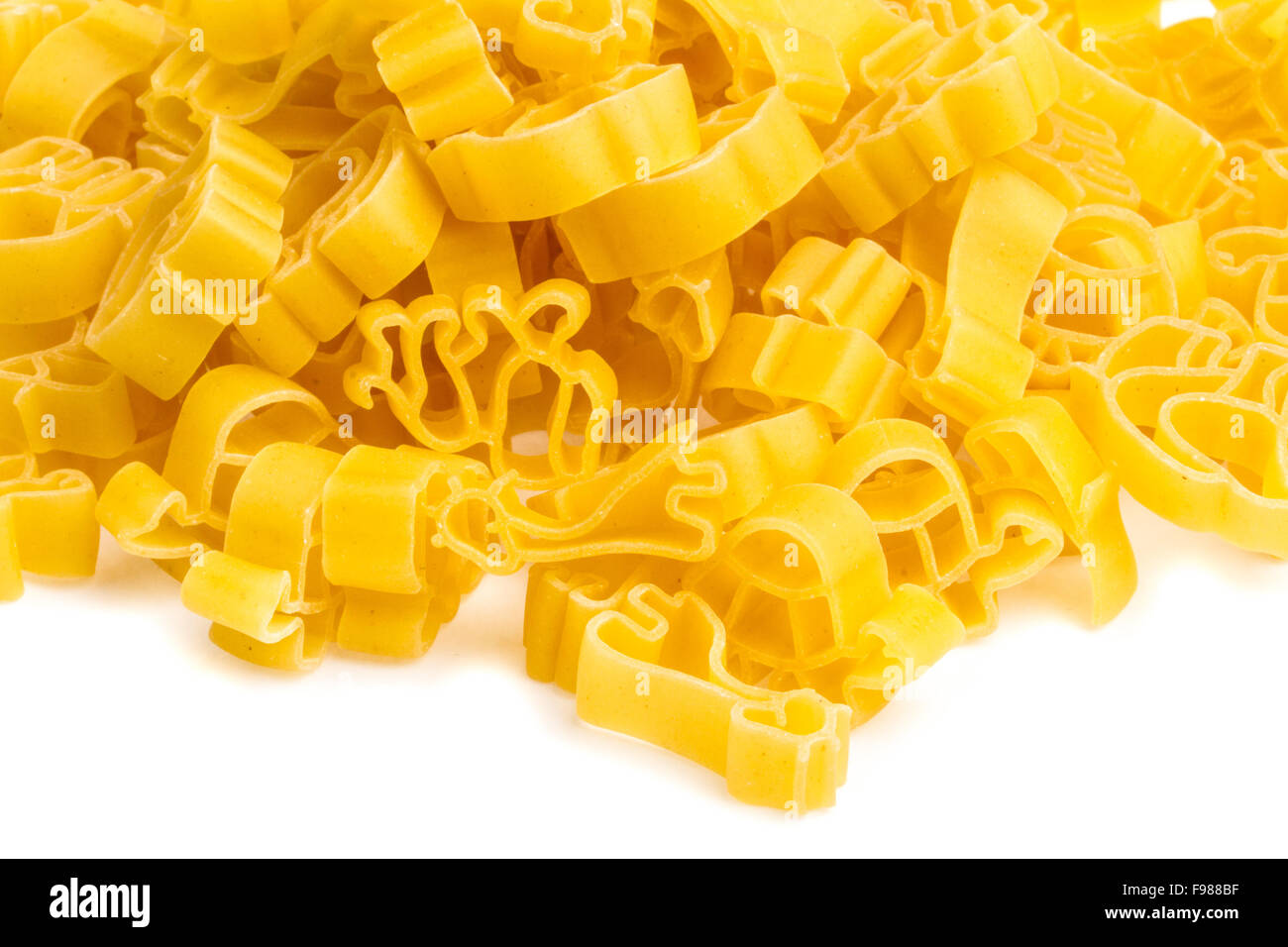 Raw yellow Italian pasta Stock Photo - Alamy