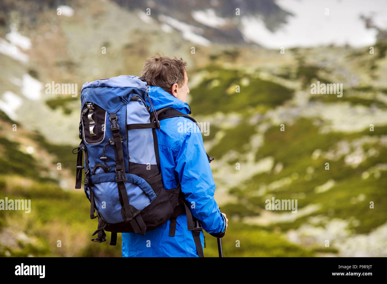 Old man hiking mountains hi-res stock photography and images - Alamy