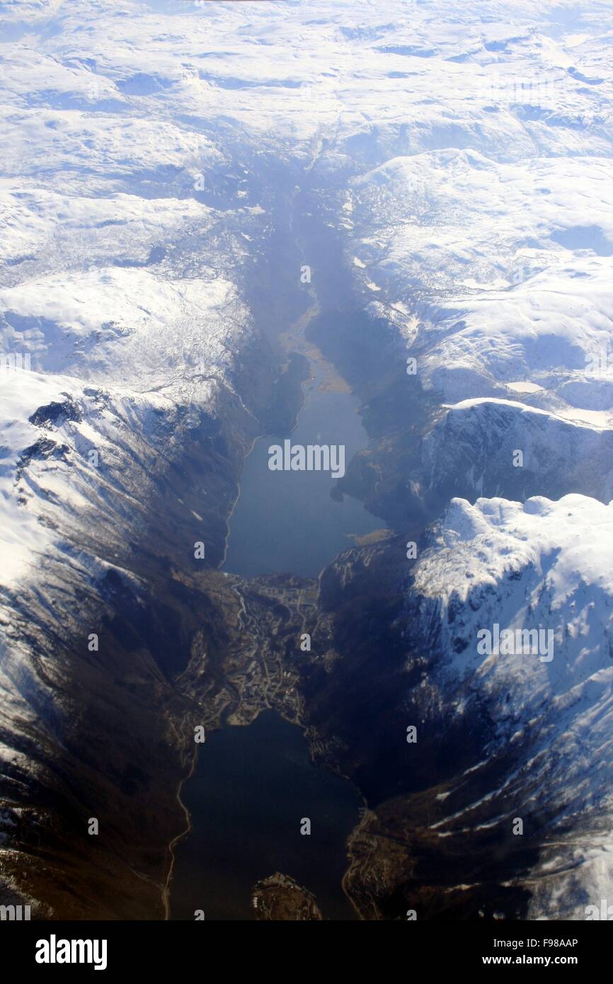 View of snowy mountains with deep valley Stock Photo - Alamy