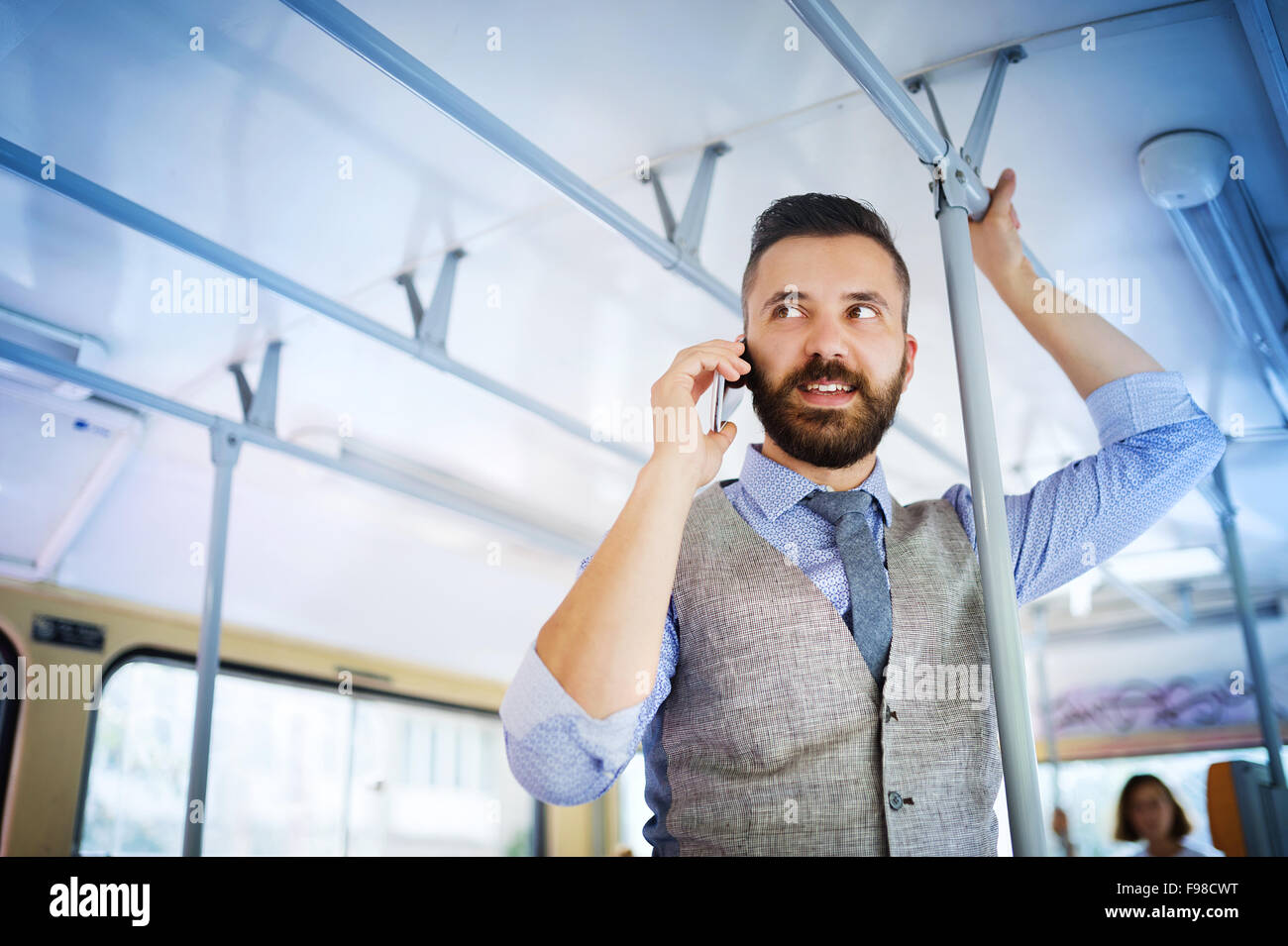 Man mobile phone bus hi-res stock photography and images - Alamy