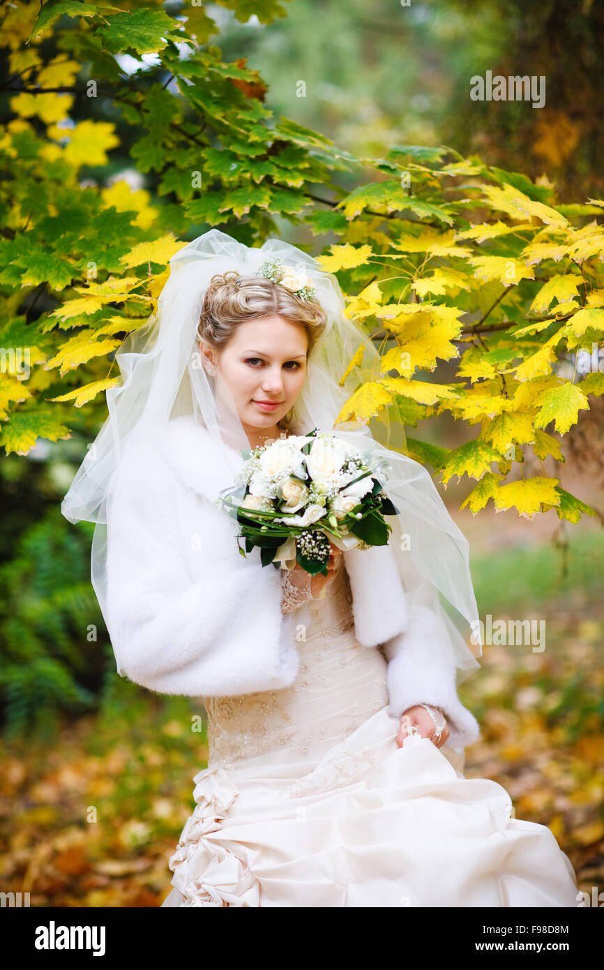 bride in autumn Stock Photo - Alamy