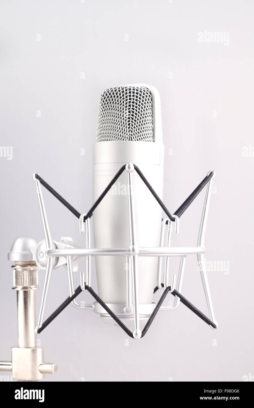 Professional studio microphone on white background Stock Photo - Alamy