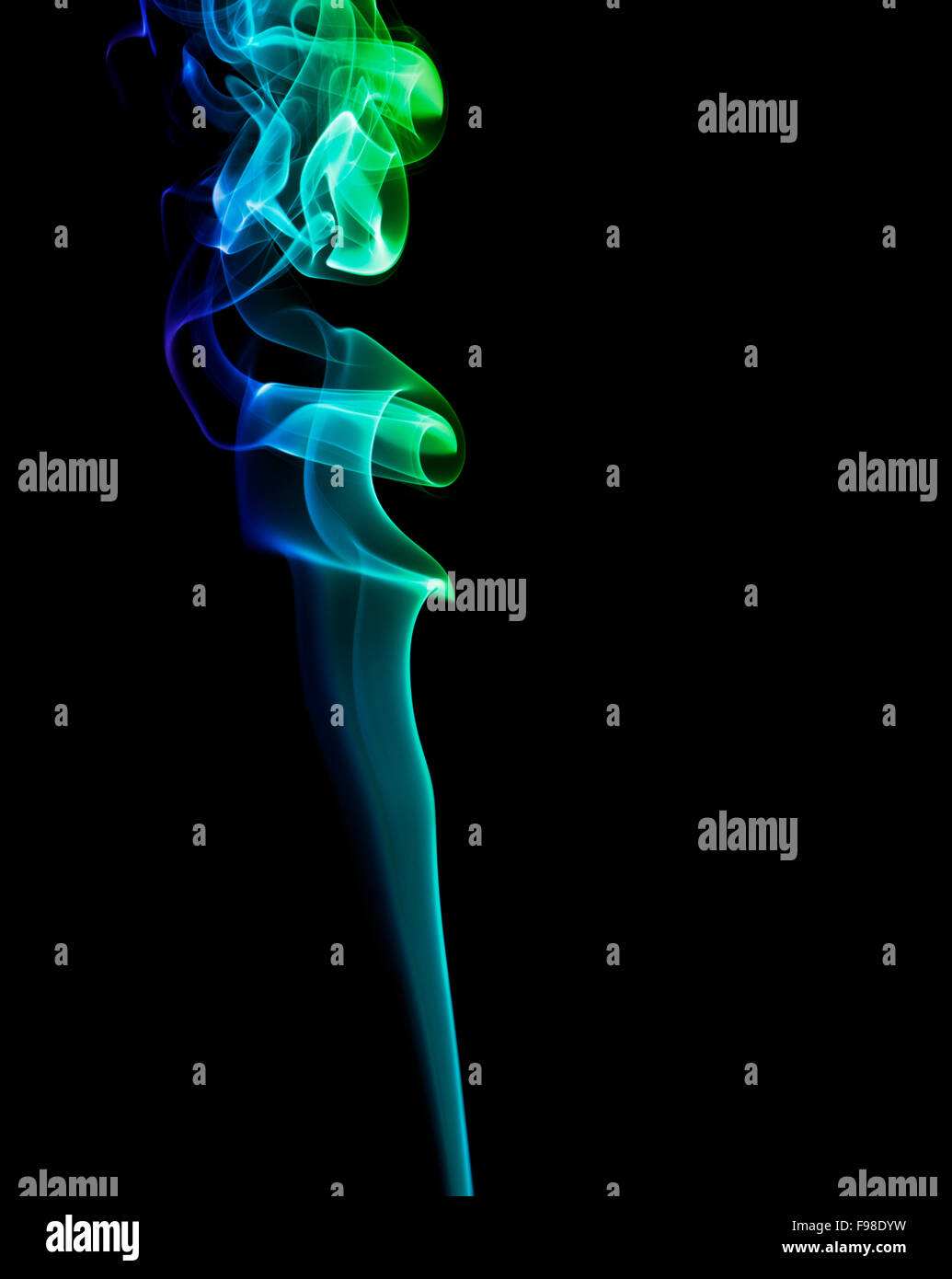 Fume of a incense stick, black background Stock Photo - Alamy
