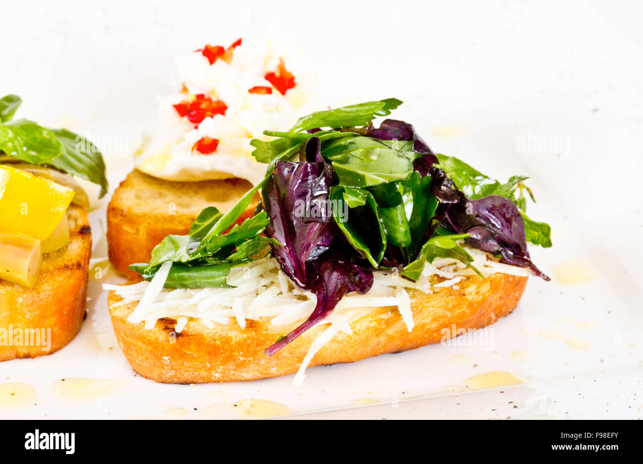 different colored Canapes on a white background Stock Photo - Alamy