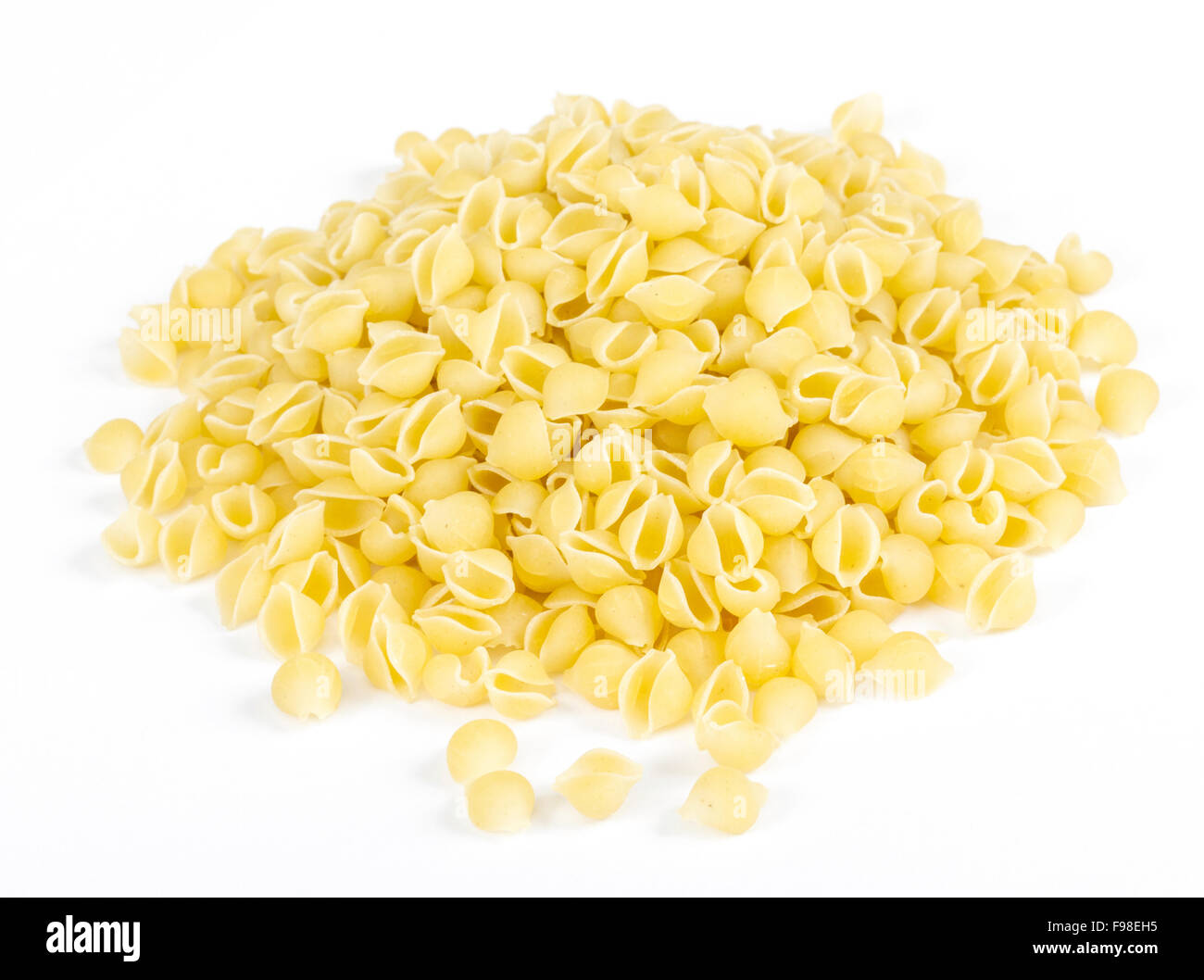 Heap of raw pasta (conchiglie Stock Photo - Alamy