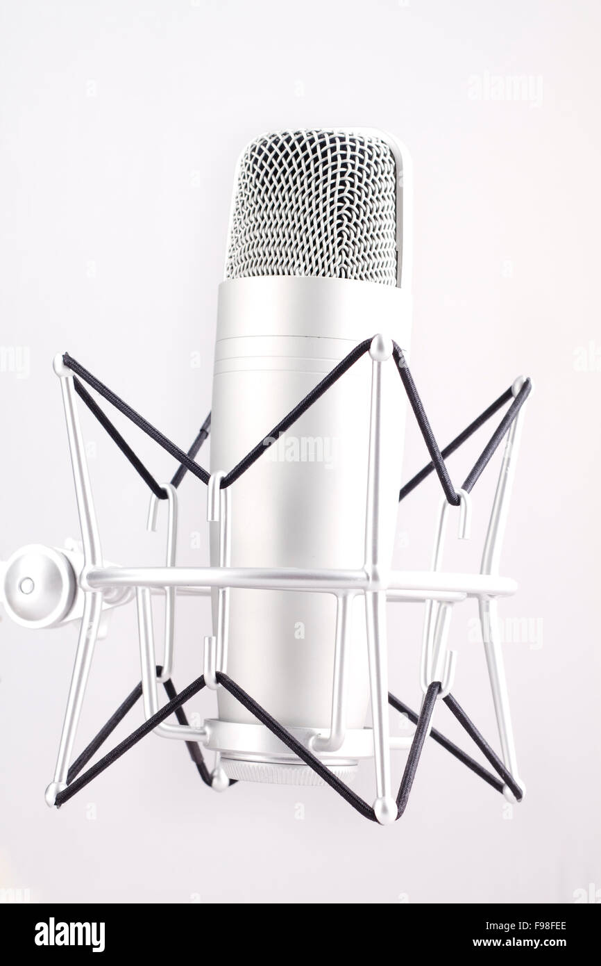 Professional studio microphone on white background Stock Photo - Alamy