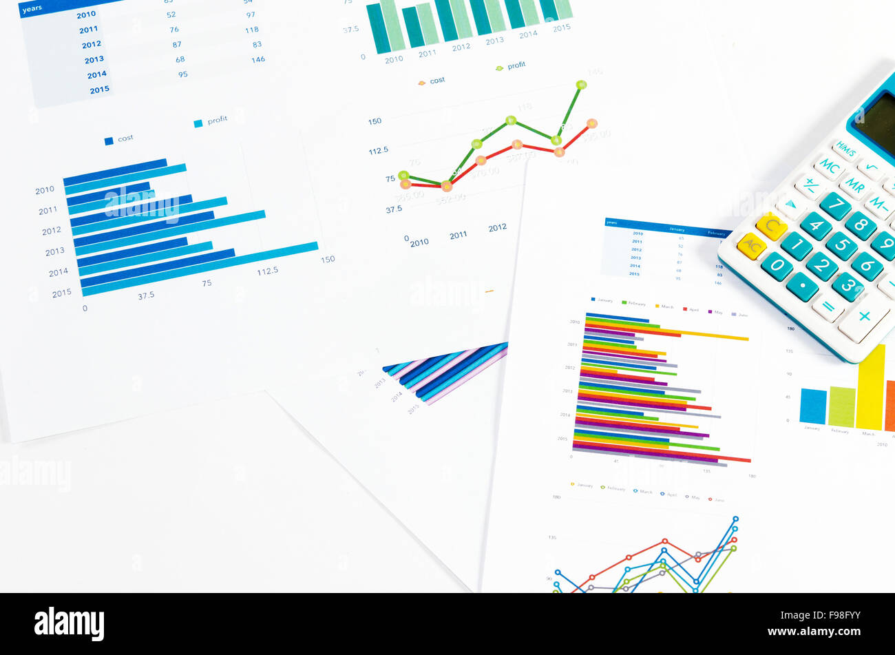 calculator on paper table with diagram Stock Photo - Alamy