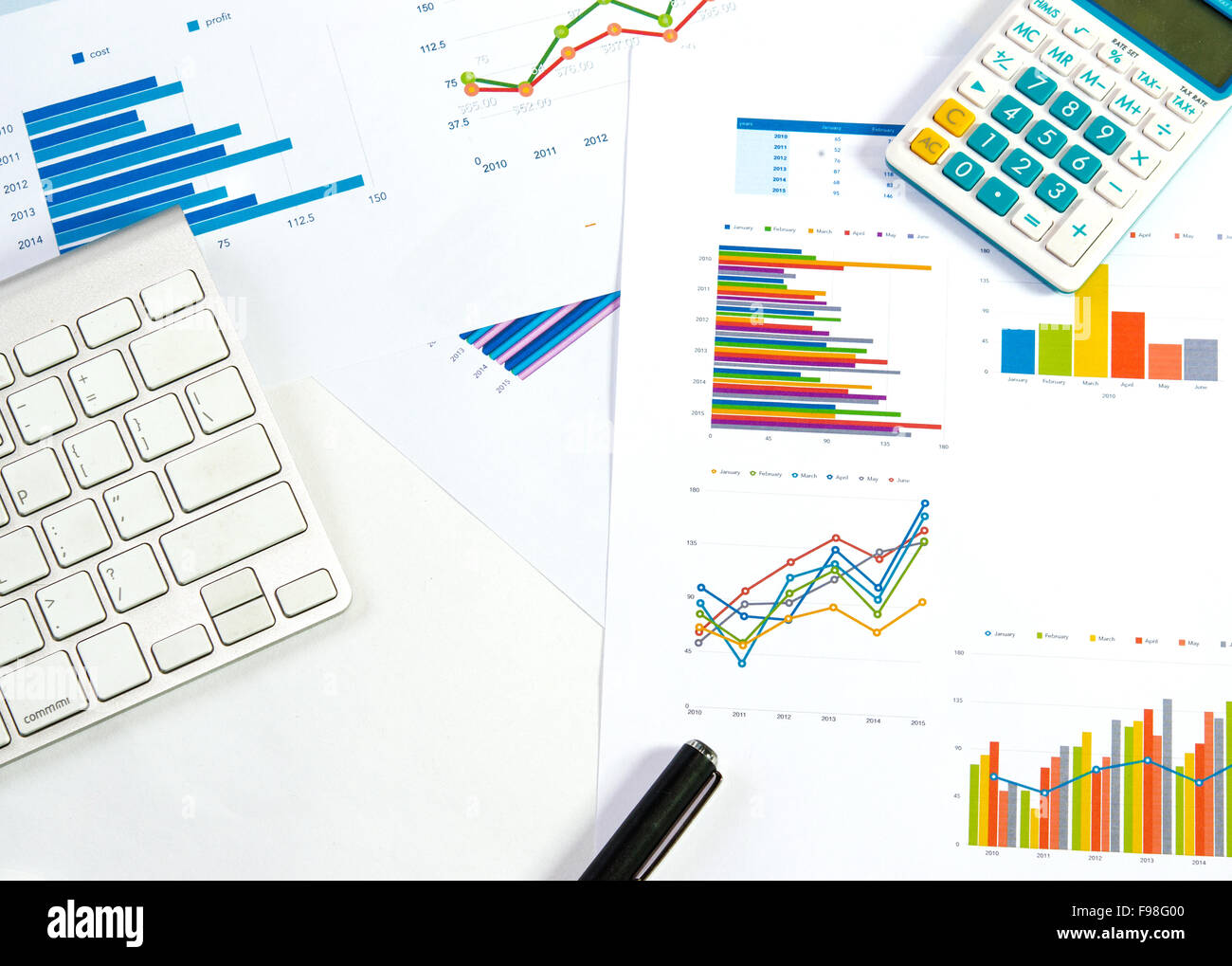 financial charts and graphs on the table Stock Photo - Alamy