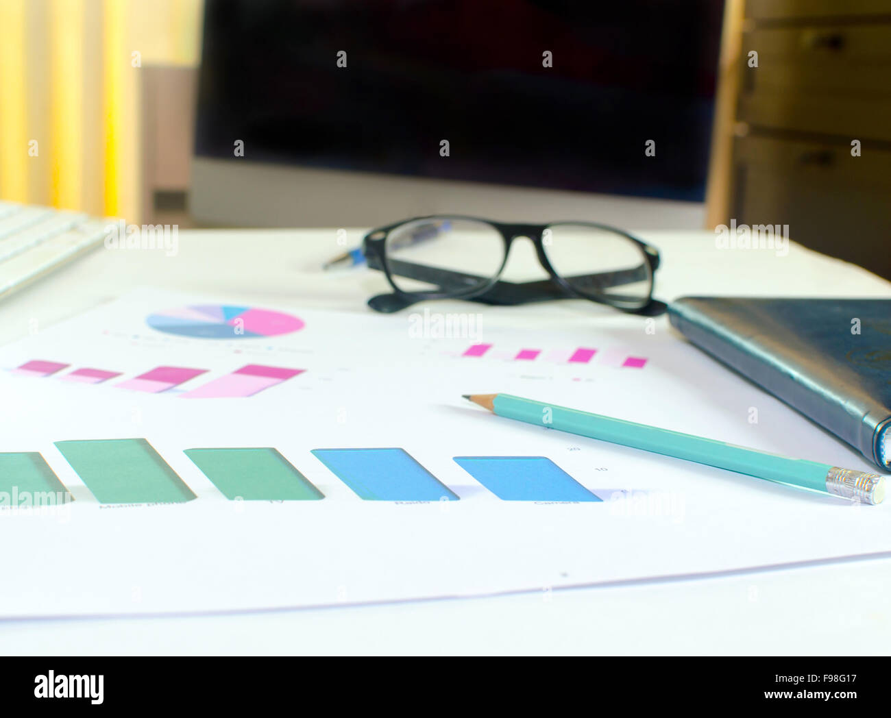 Financial paper charts and graphs on the table Stock Photo - Alamy