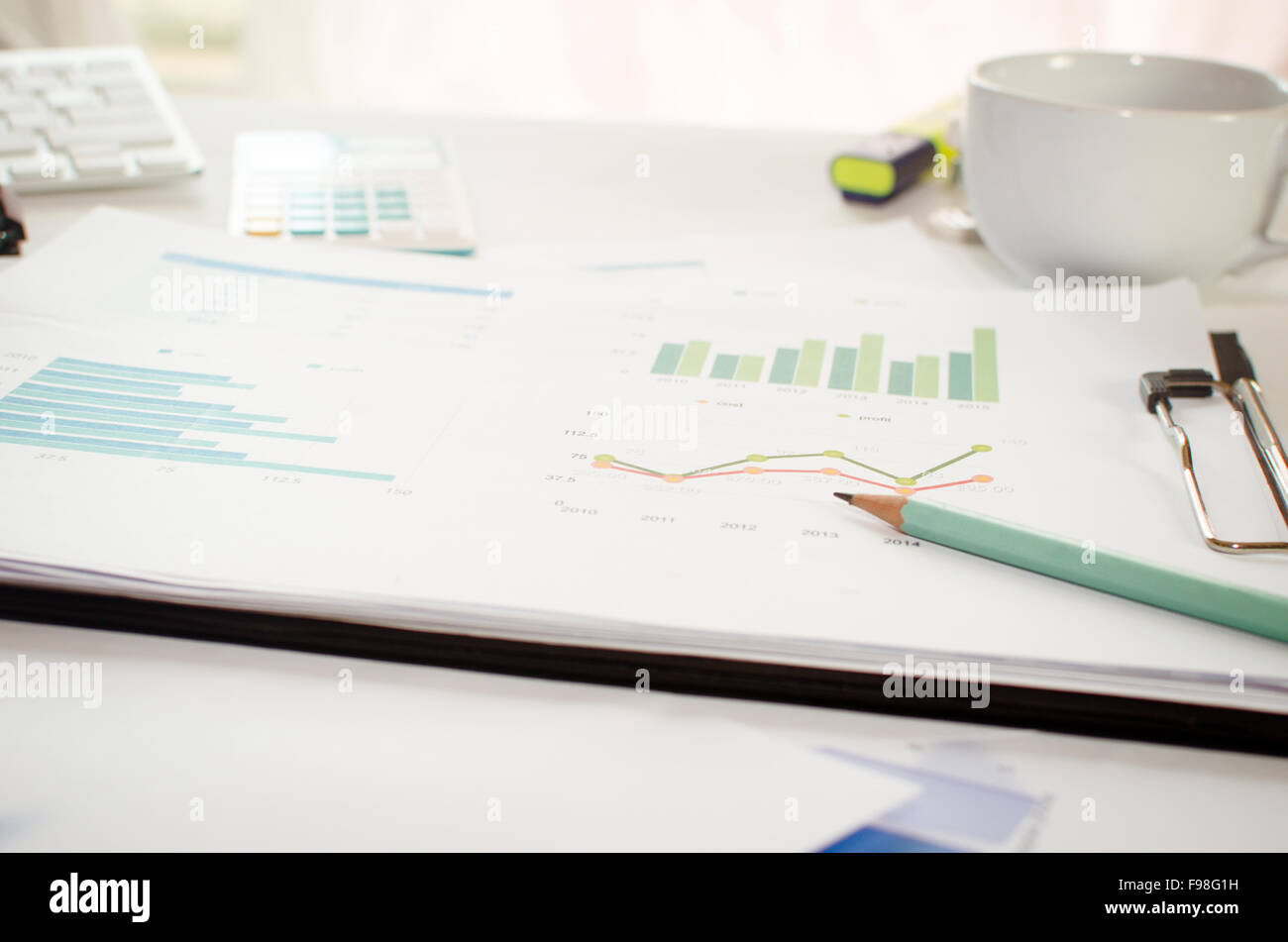 business chart and graph on the desk Stock Photo - Alamy