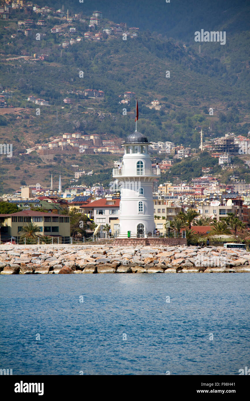 Lighthouse in port. Turkey, Alanya. Sunny weather Stock Photo - Alamy