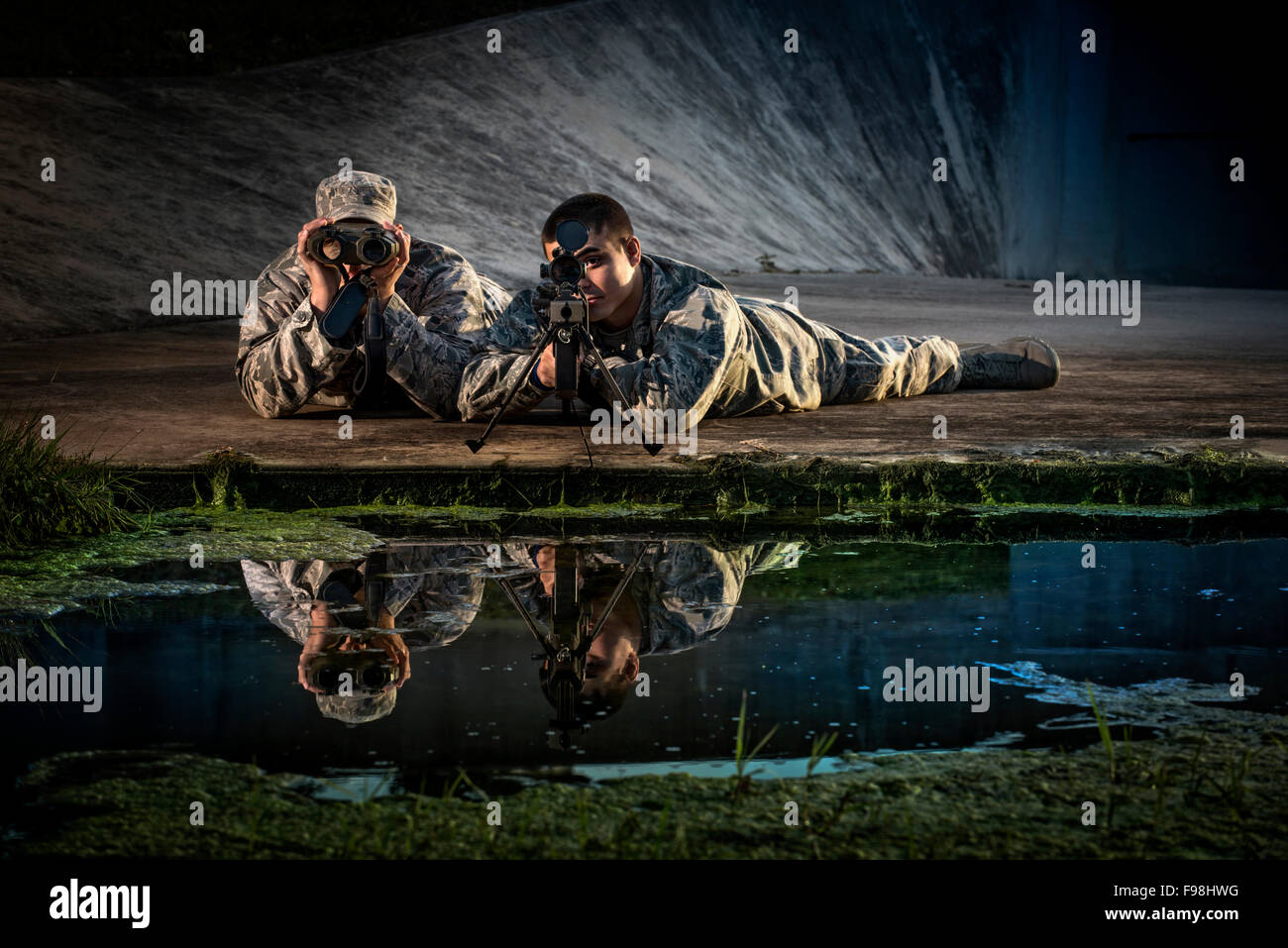 An advanced Air Force Security Forces sniper team observe potential ...