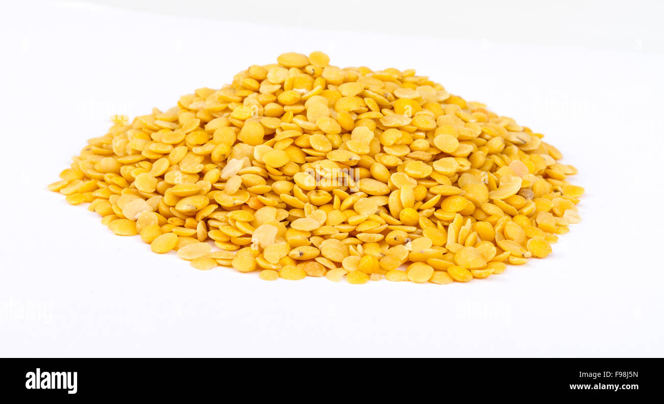 Yellow lentils isolated on white background.Macro shot Stock Photo - Alamy