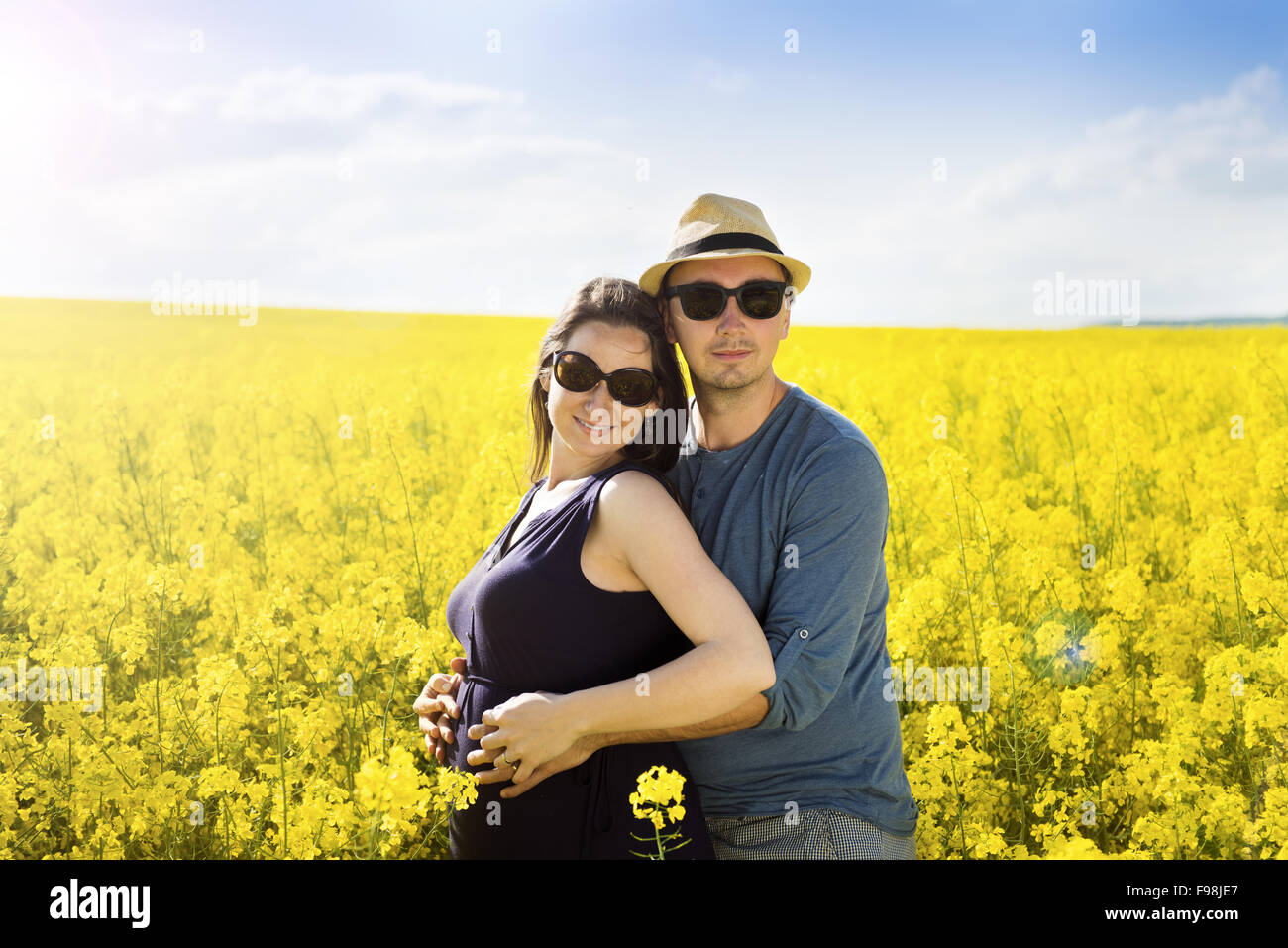 Couple kissing at blooming tree hi-res stock photography and images - Alamy