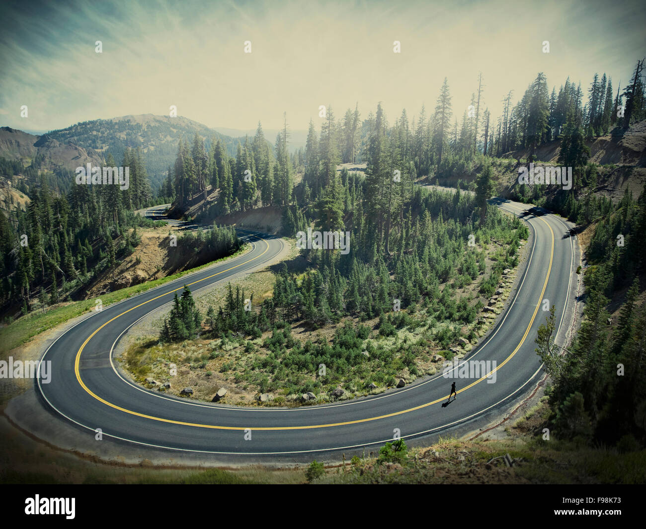 A runner runs in Lassen National Park in California Stock Photo - Alamy