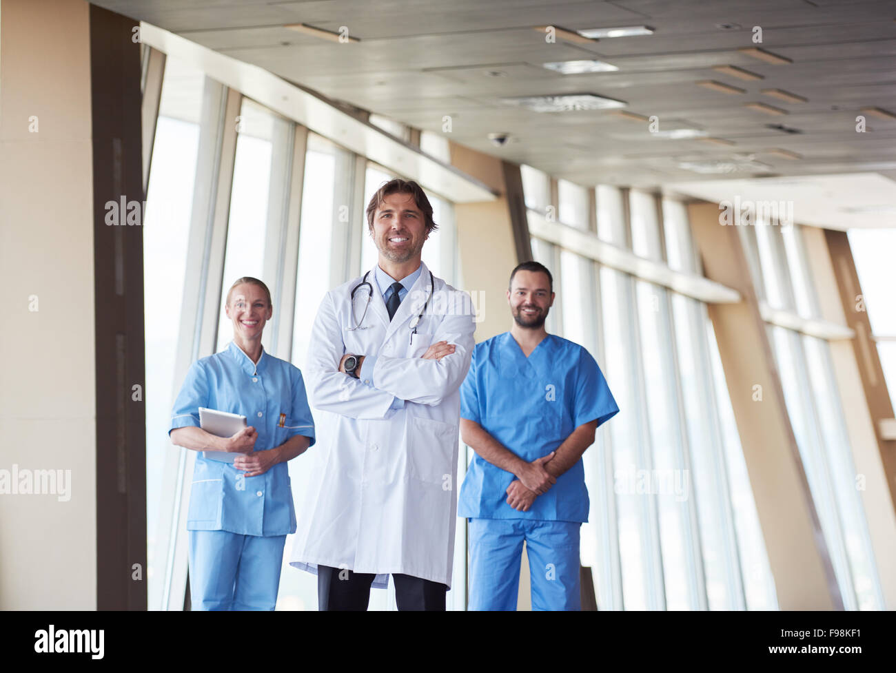 group of medical staff at hospital, doctors team standing together ...