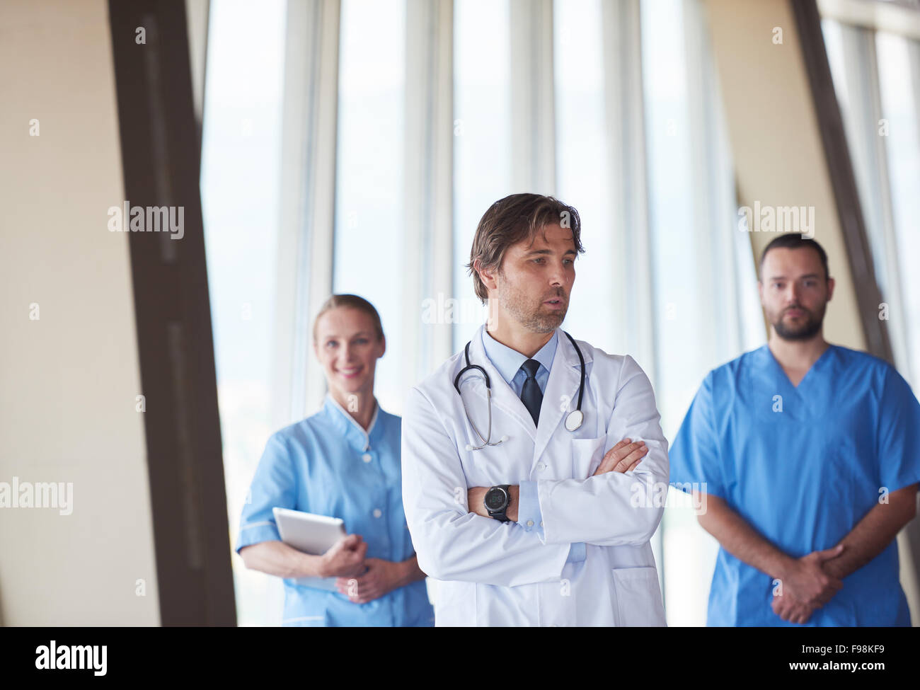 group of medical staff at hospital, doctors team standing together ...