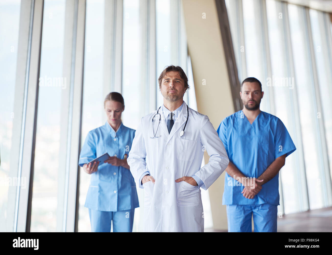 group of medical staff at hospital, doctors team standing together ...