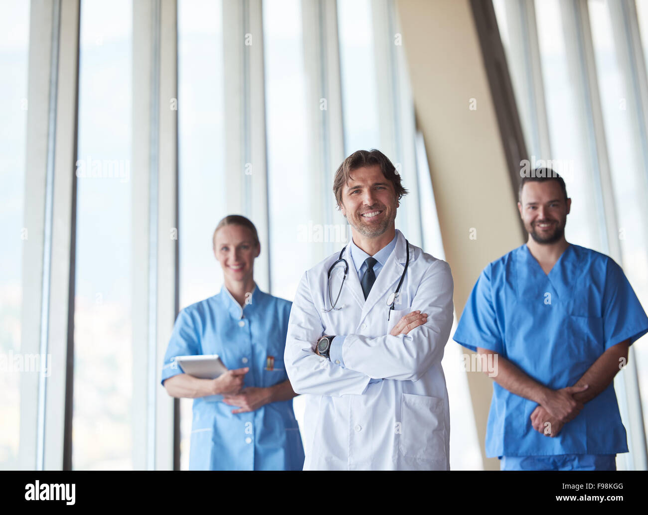 group of medical staff at hospital, doctors team standing together ...