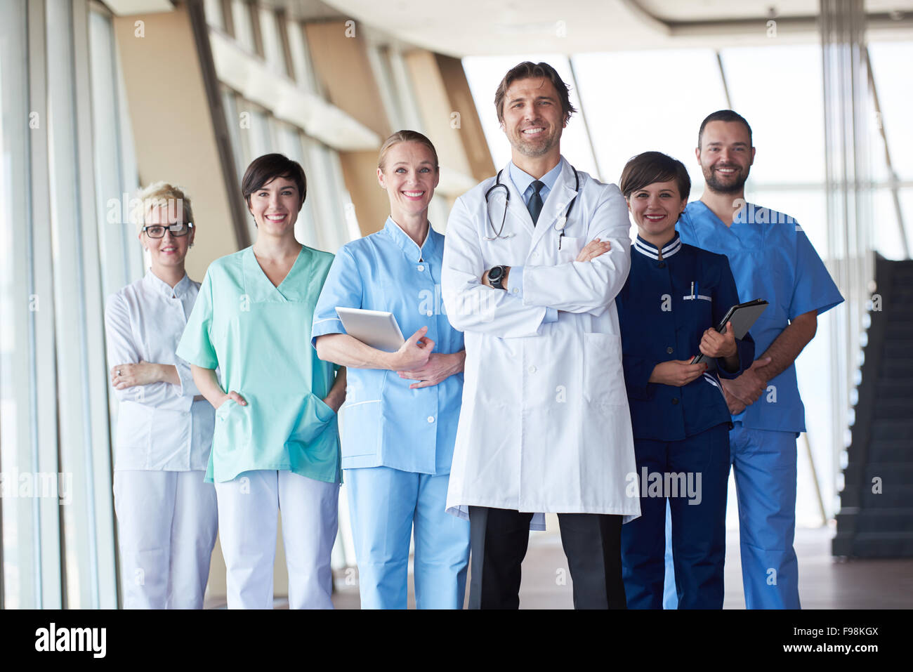 group of medical staff at hospital, doctors team standing together ...