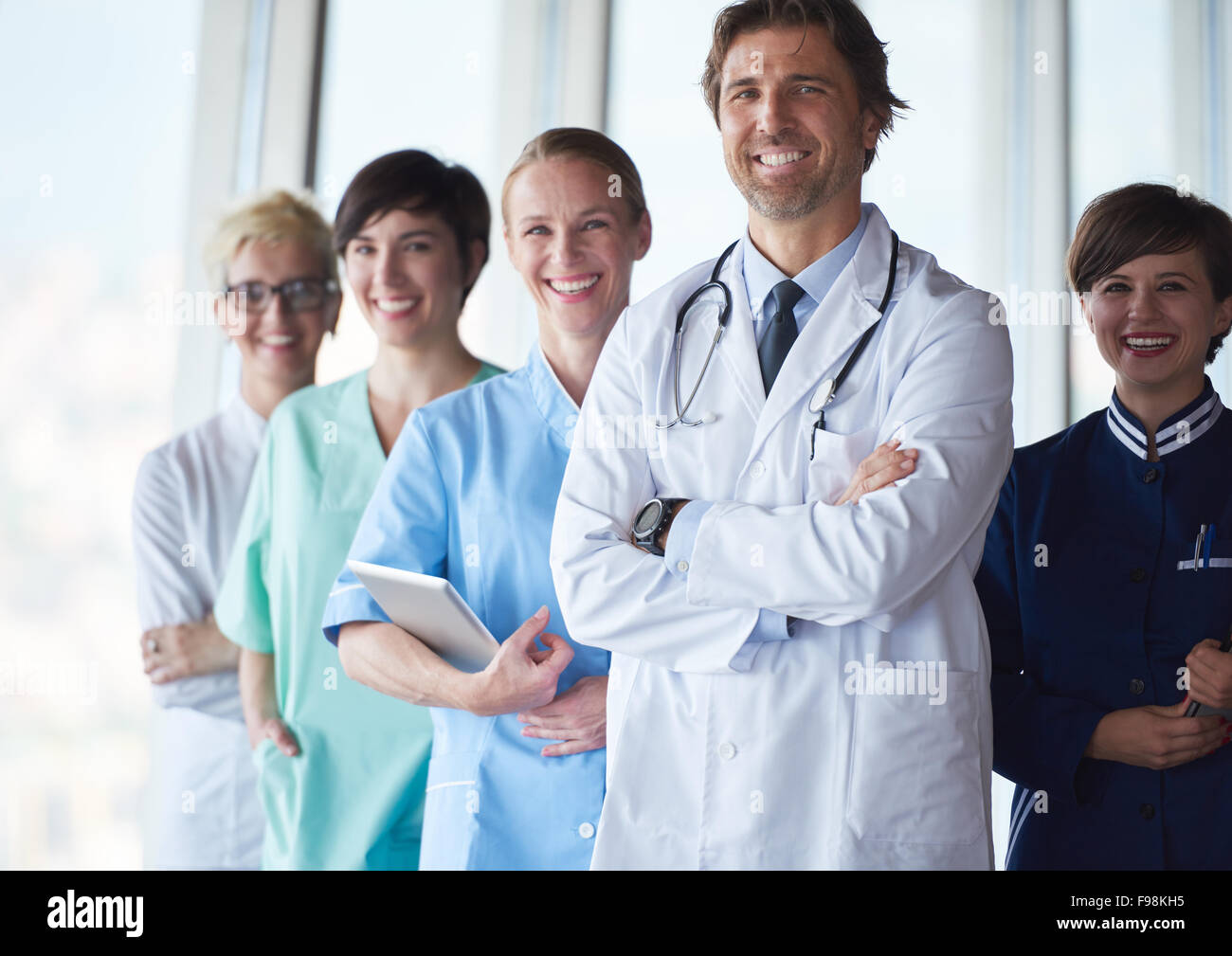 group of medical staff at hospital, doctors team standing together ...