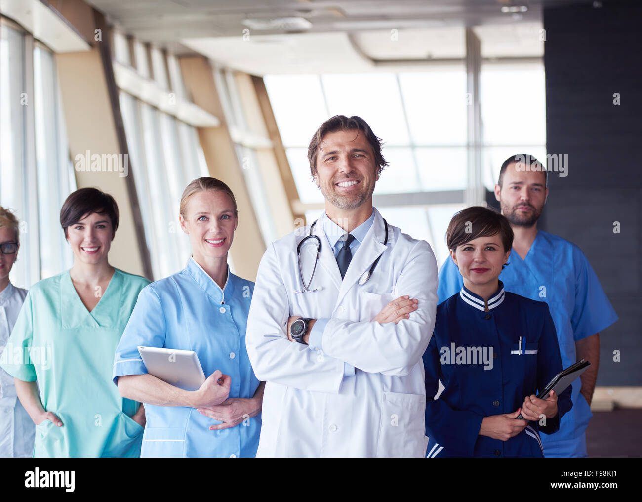 group of medical staff at hospital, doctors team standing together ...