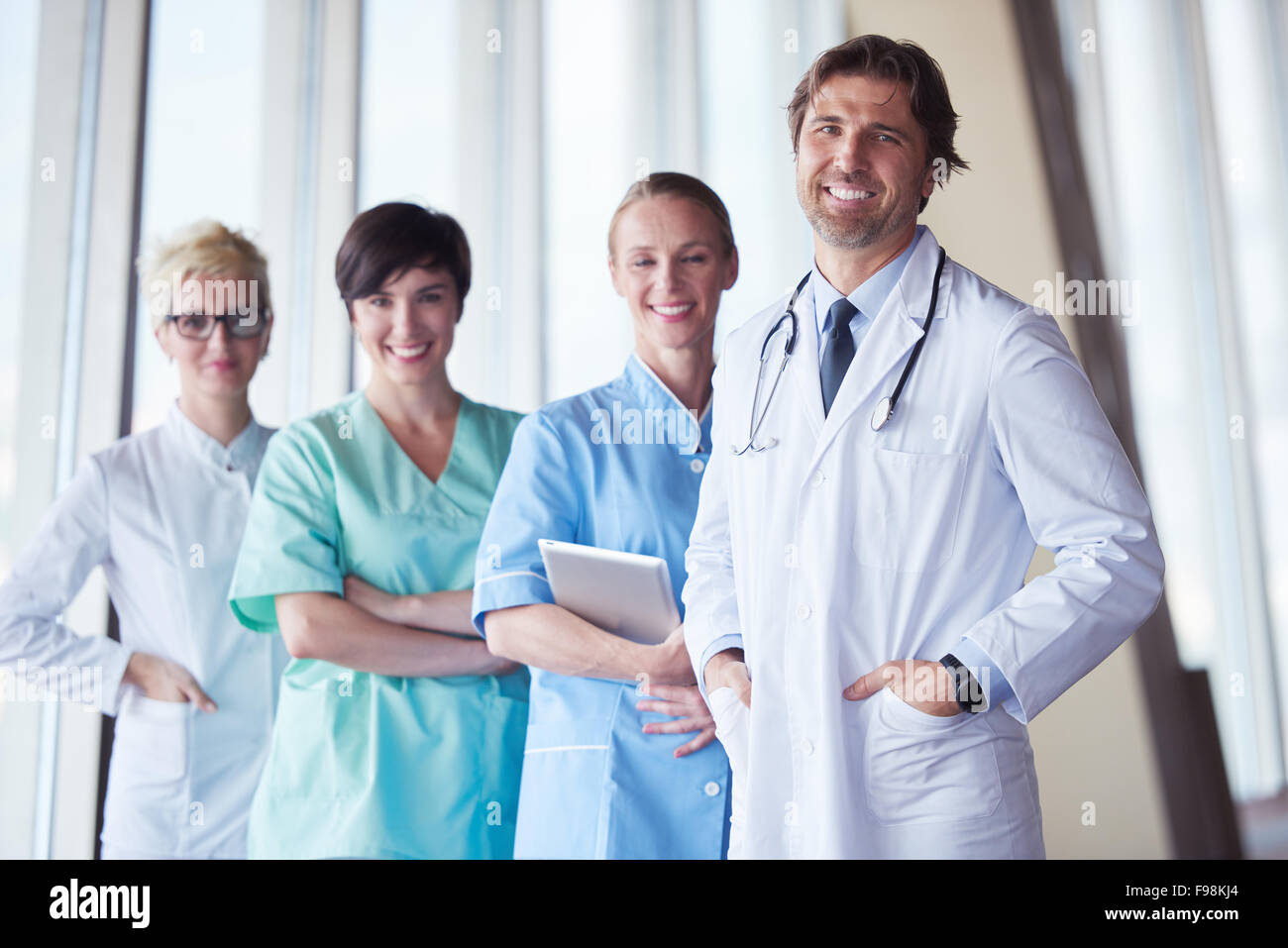 group of medical staff at hospital, doctors team standing together ...