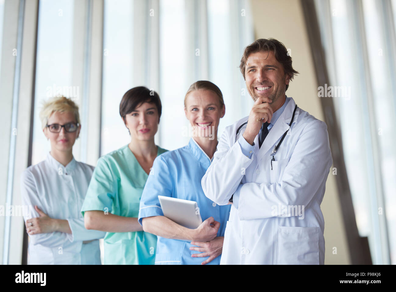 group of medical staff at hospital, doctors team standing together ...