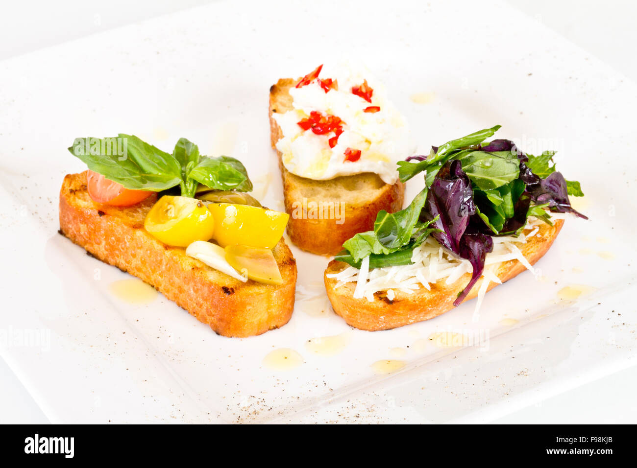 different colored Canapes on a white background Stock Photo - Alamy