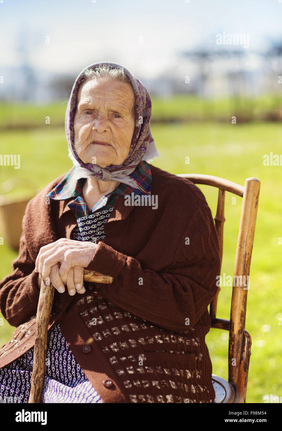 Old woman with scarf hi-res stock photography and images - Alamy