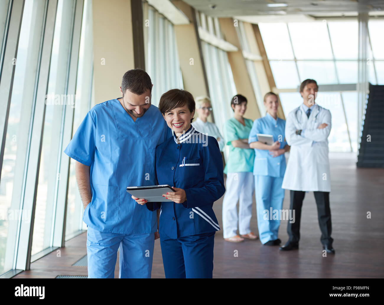 group of medical staff at hospital, doctors team standing together ...