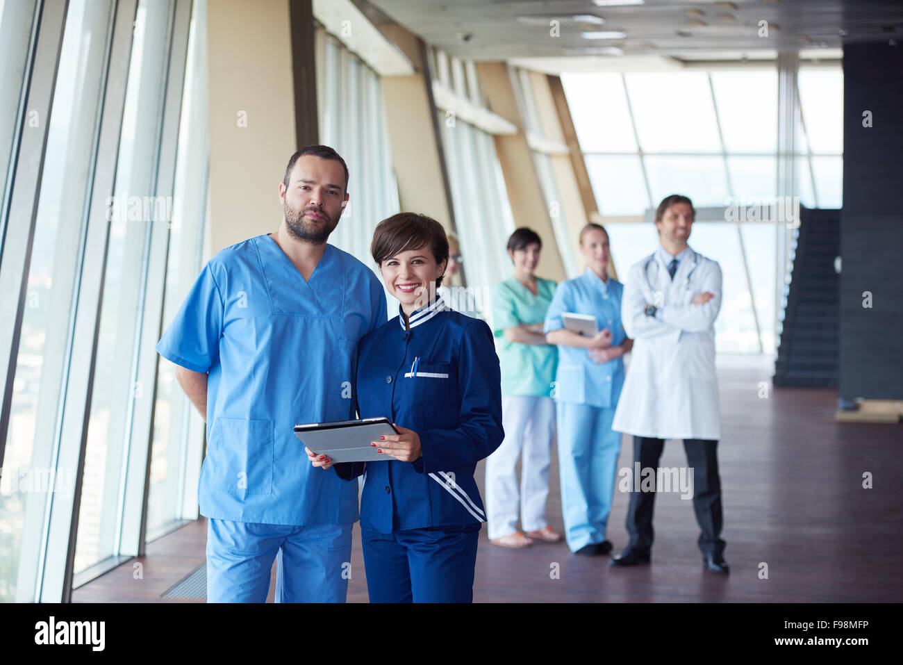 group of medical staff at hospital, doctors team standing together ...