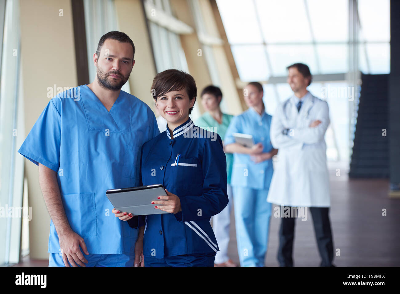 group of medical staff at hospital, doctors team standing together ...