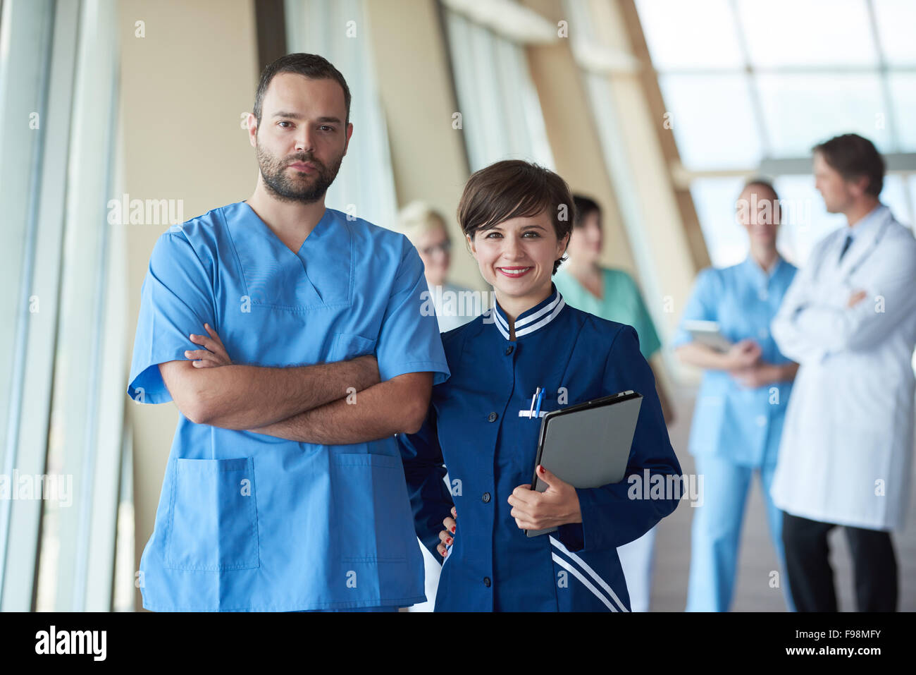group of medical staff at hospital, doctors team standing together ...