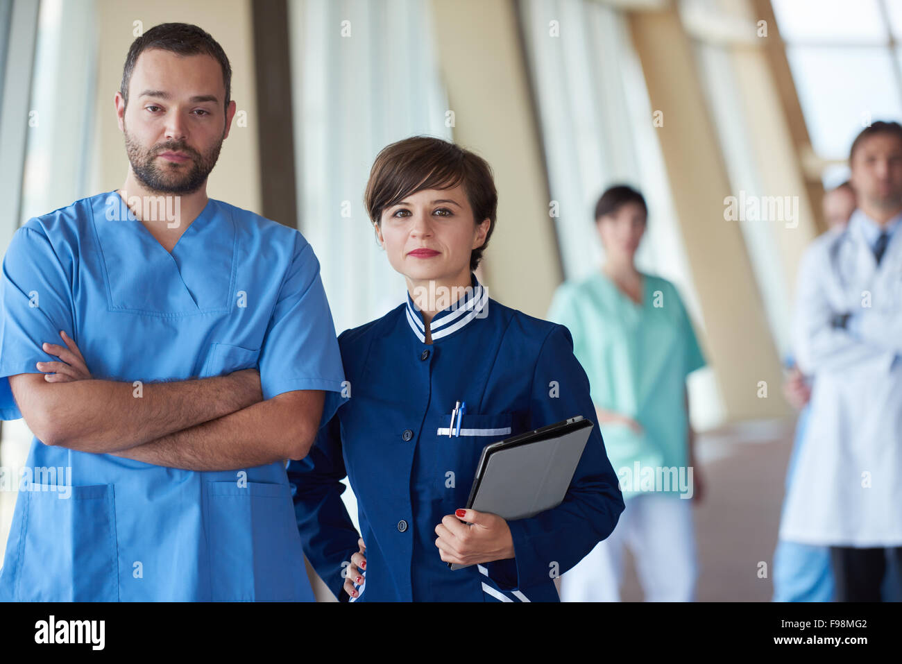 group of medical staff at hospital, doctors team standing together ...