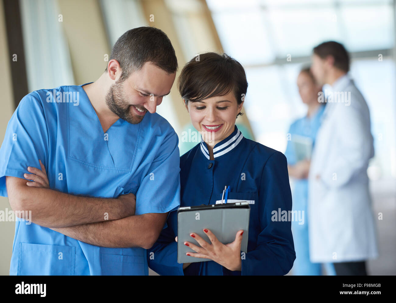 group of medical staff at hospital, doctors team standing together ...